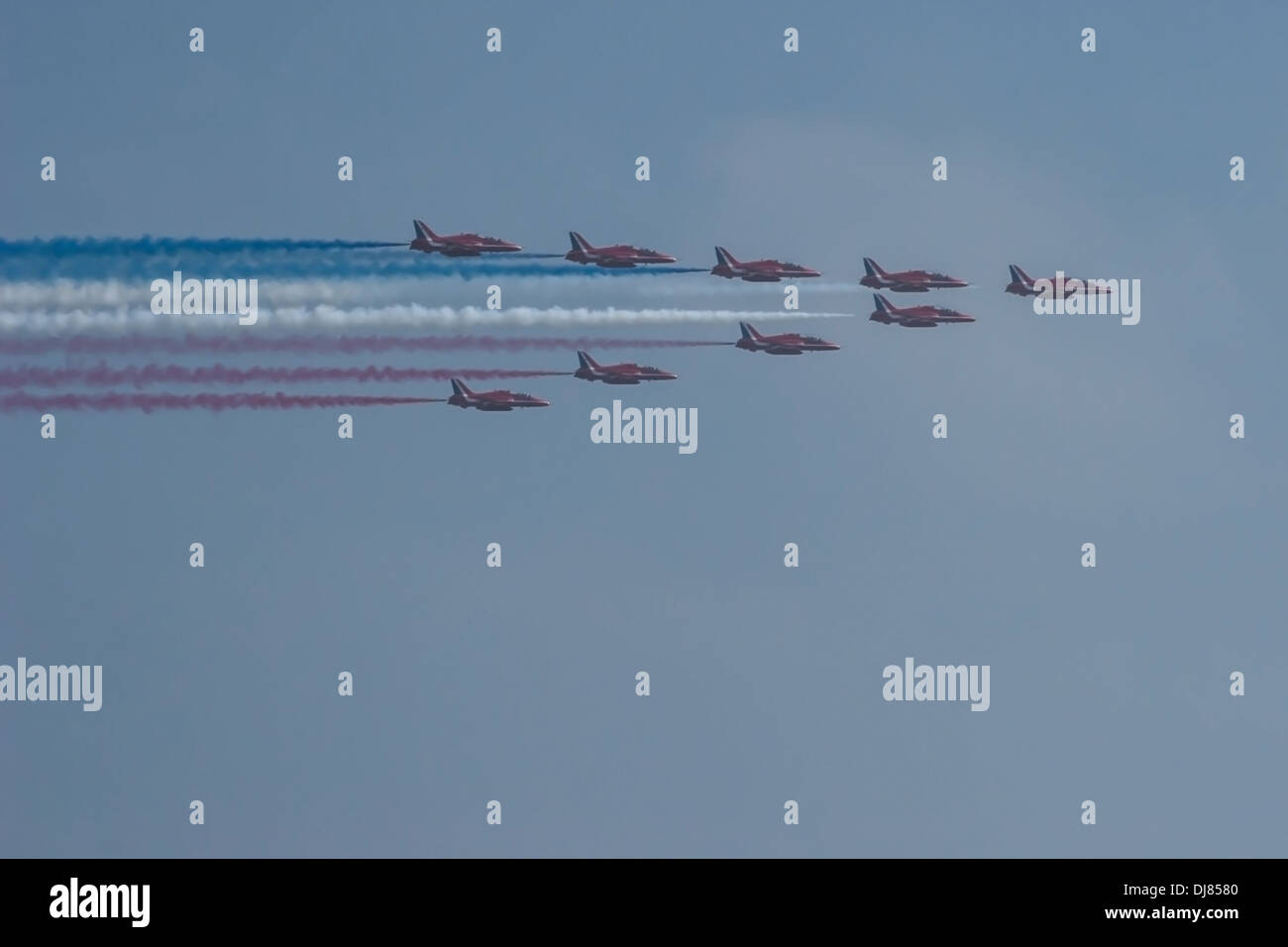 The Red Arrows flying in formation over Bournemouth Beach Stock Photo ...