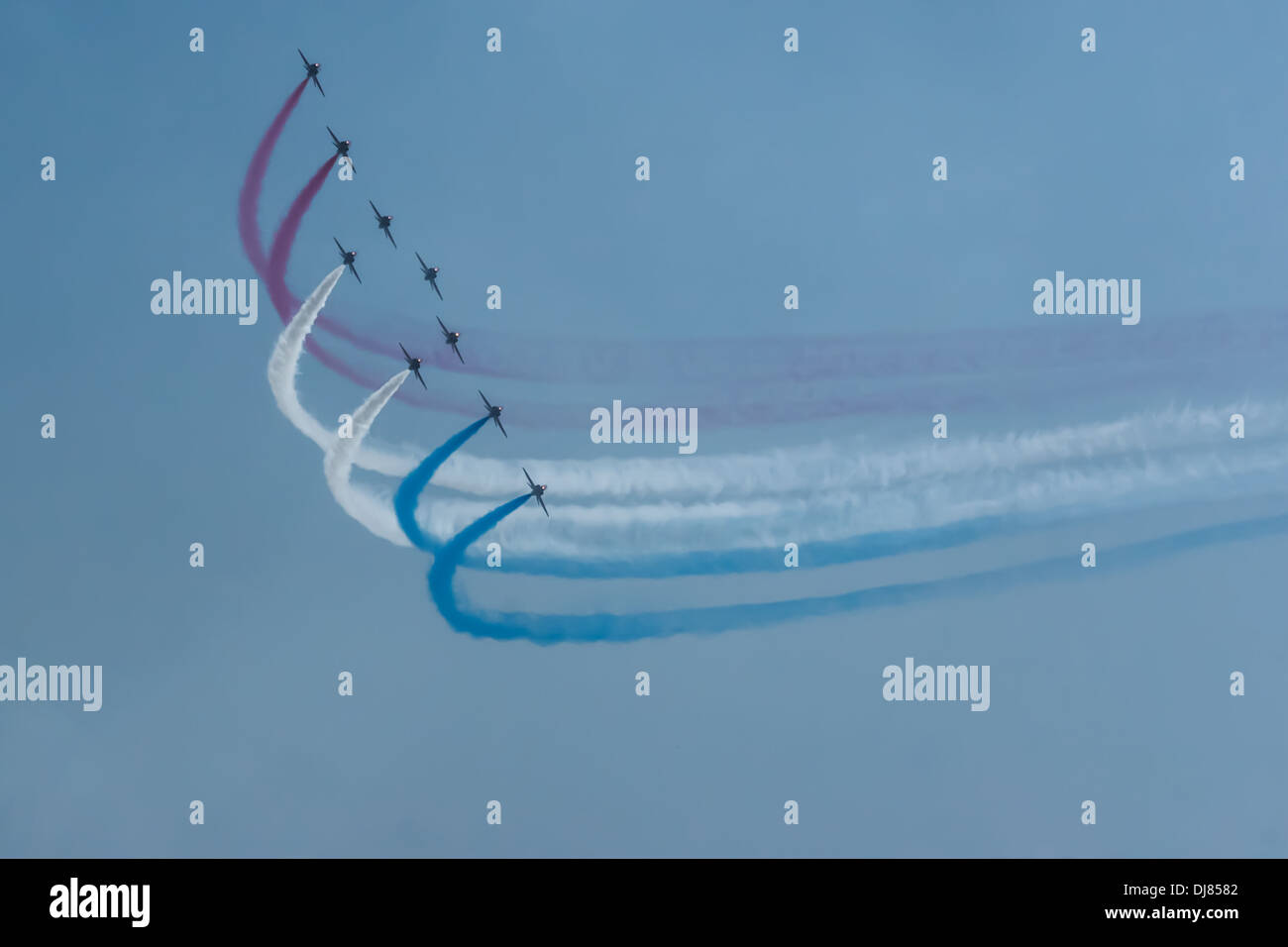 The Red Arrows flying in formation over Bournemouth Beach Stock Photo ...