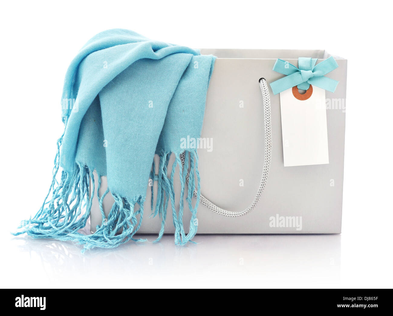 Blue scarf in shopping bag with tag isolated on a white background ...