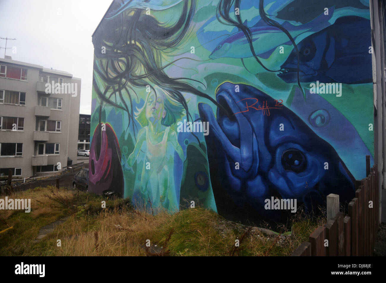 Mural on wall of apartment block in downtown Reykjavik depicting ...