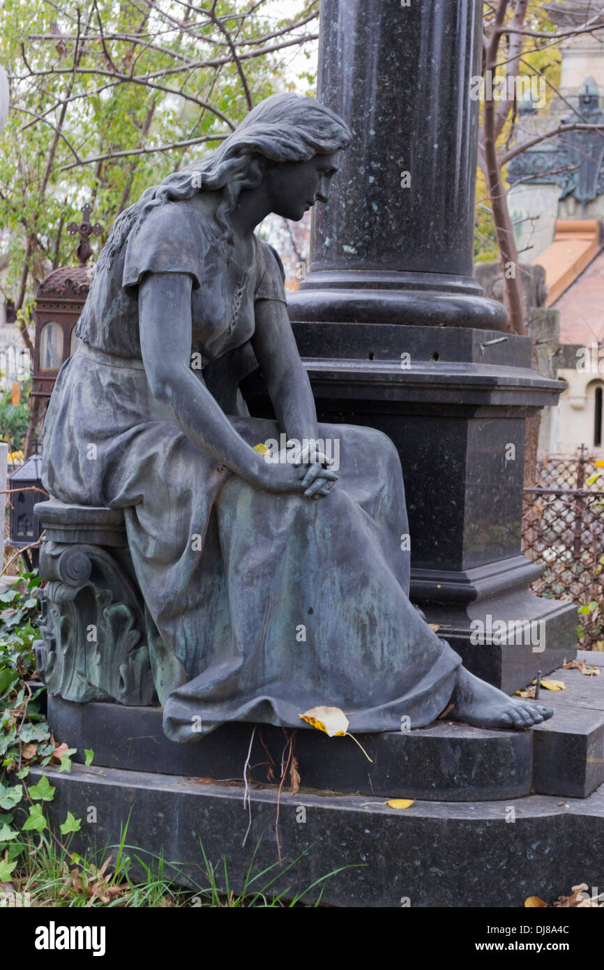 Statue of a mourning woman in Bellu Orthodox Cemetery, Bucharest ...