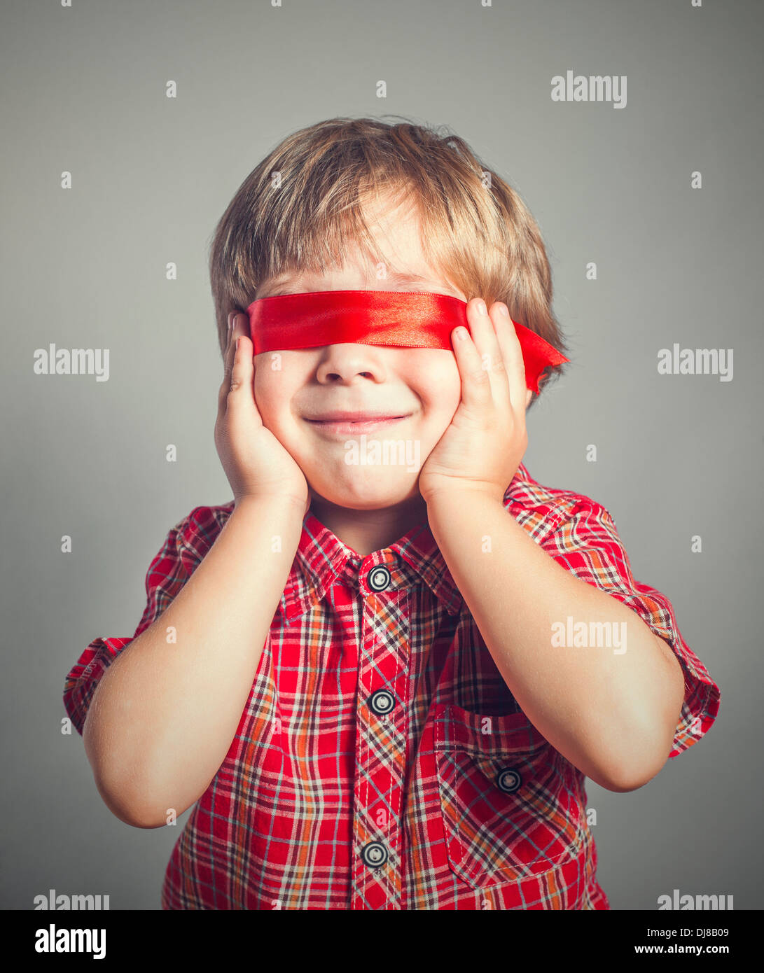 boy closed his eyes the ribbon Stock Photo - Alamy
