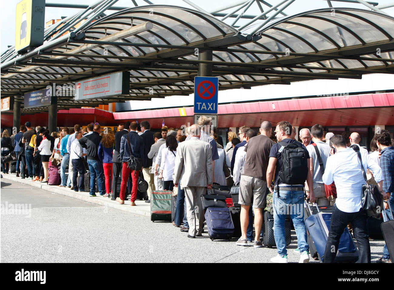 Passengers waiting for long periods of time in line for taxis at Tegel ...