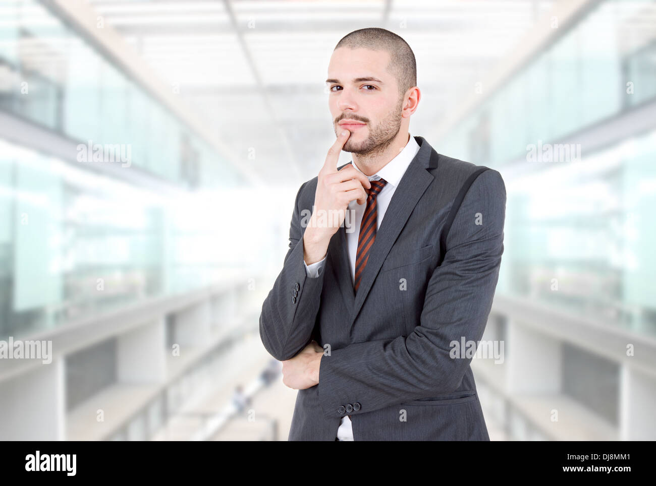 young business man thinking at the office Stock Photo - Alamy