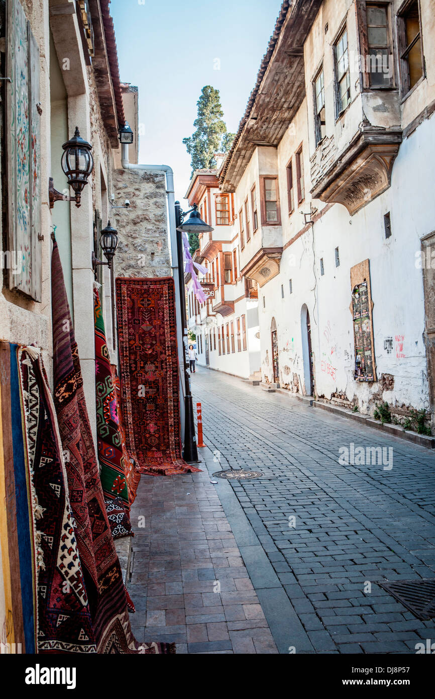 Colourful Turkish textiles are displayed in the old town of Antalya on ...