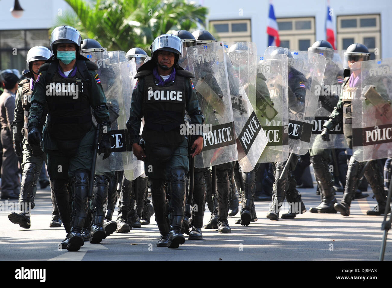 Bangkok, Thailand. 25th Nov, 2013. Riot policemen walk in the Royal ...