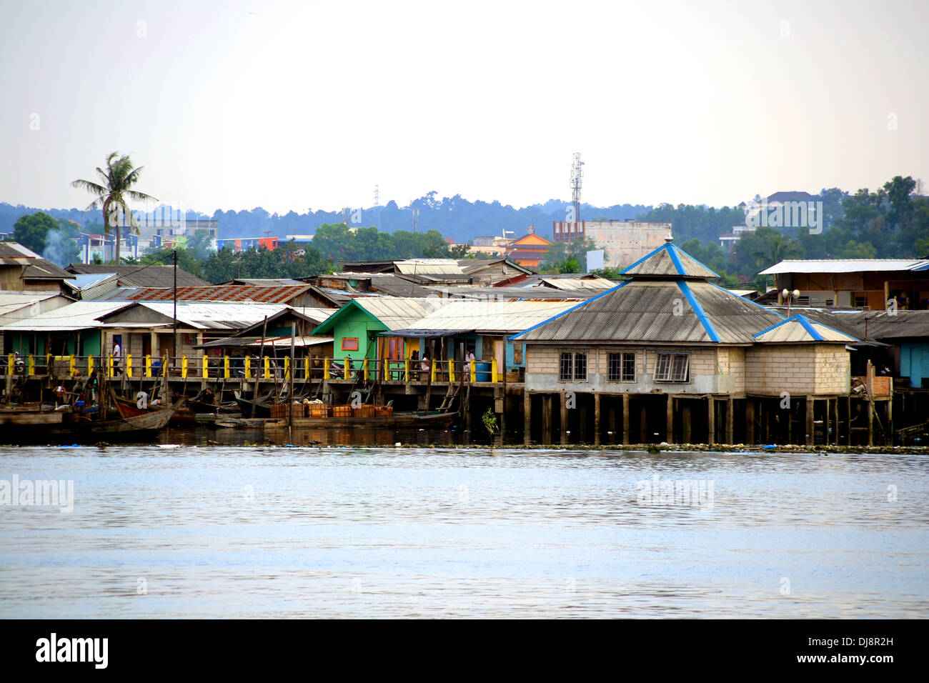Slums villages over sea at Batam, Indonesia Stock Photo - Alamy