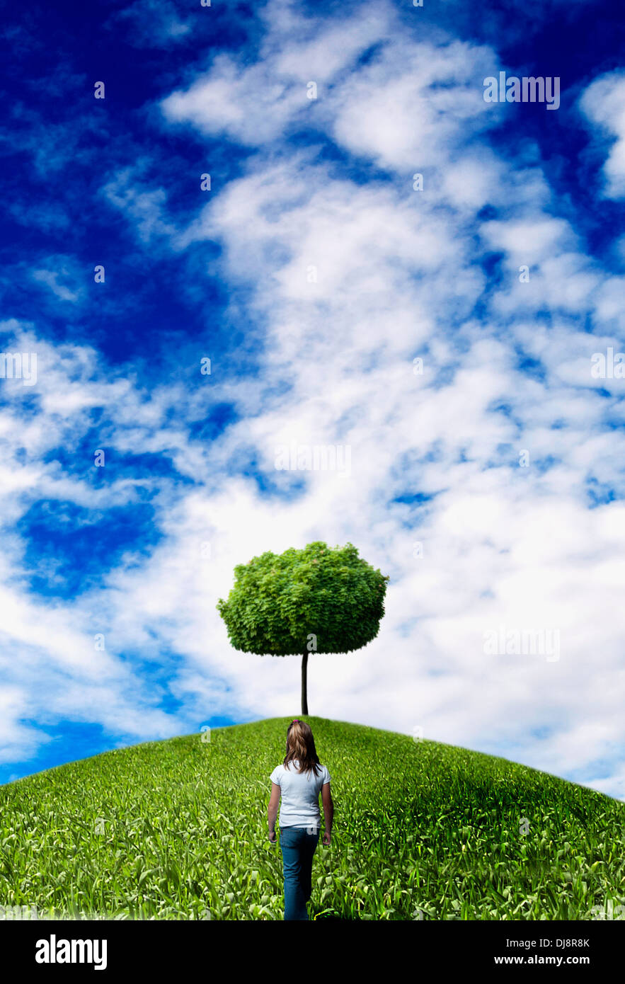 Girl walking toward tree hi-res stock photography and images - Alamy
