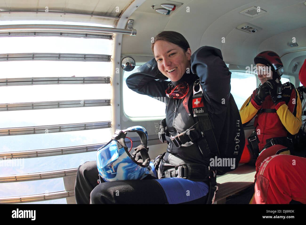 These girls are preparing for a skydiving jump in aircraft. Thereby ...