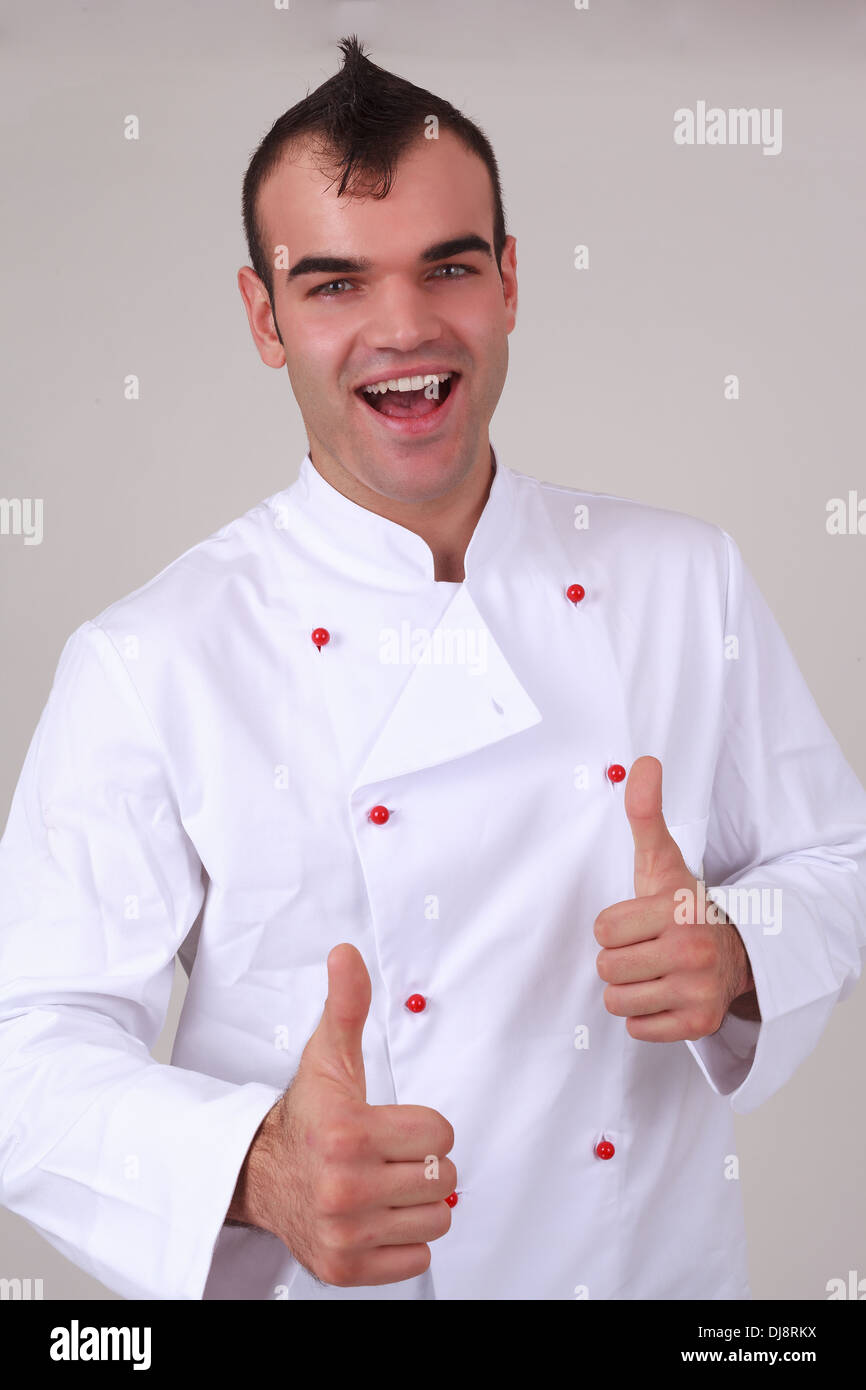 Motivated trendy chef giving a thumbs up Stock Photo - Alamy
