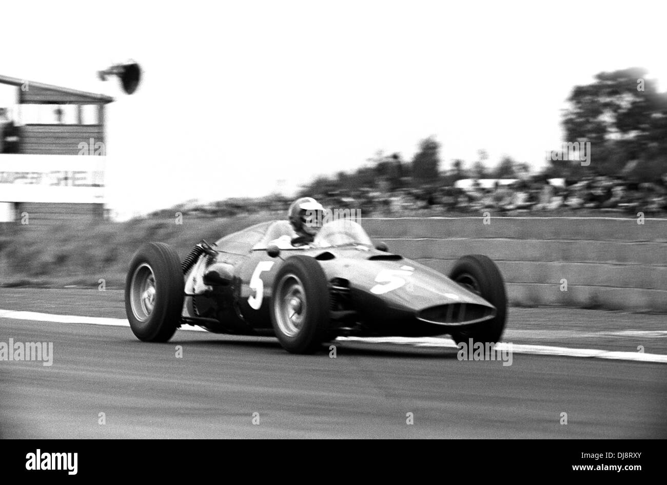 Dan Gurney in a BRM P48 at Maggott's Curve in the British Grand Prix ...