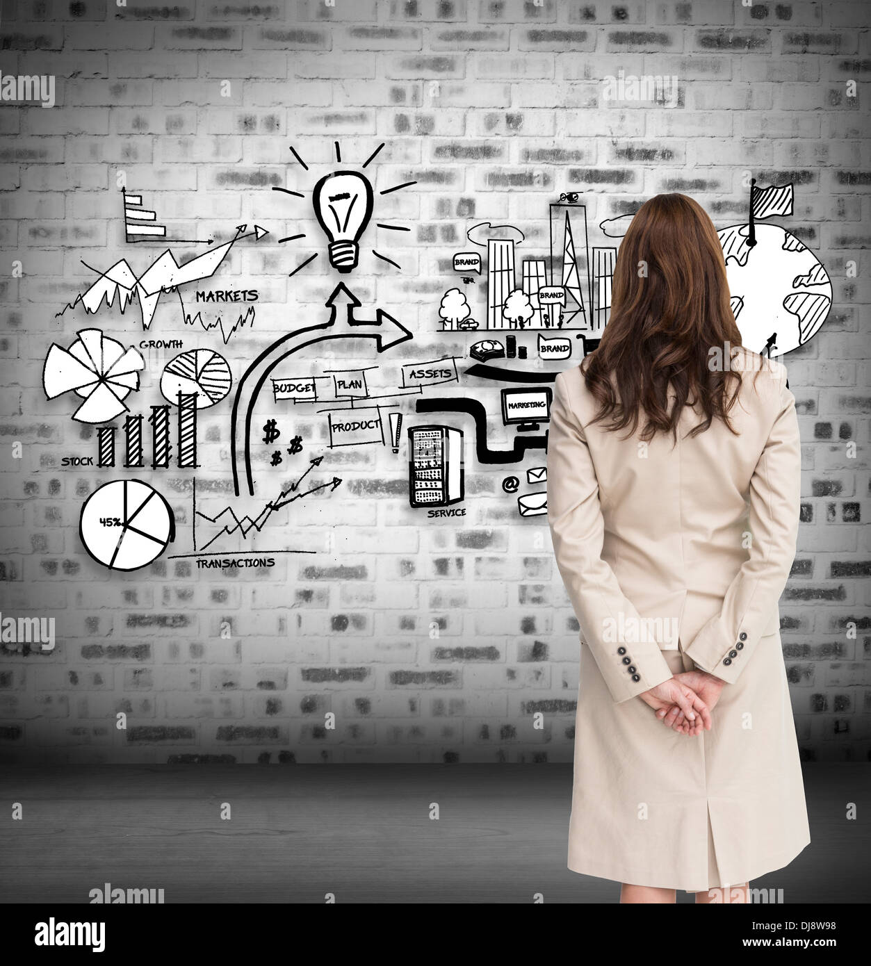 Rear view of businesswoman crossing hands behind back Stock Photo - Alamy