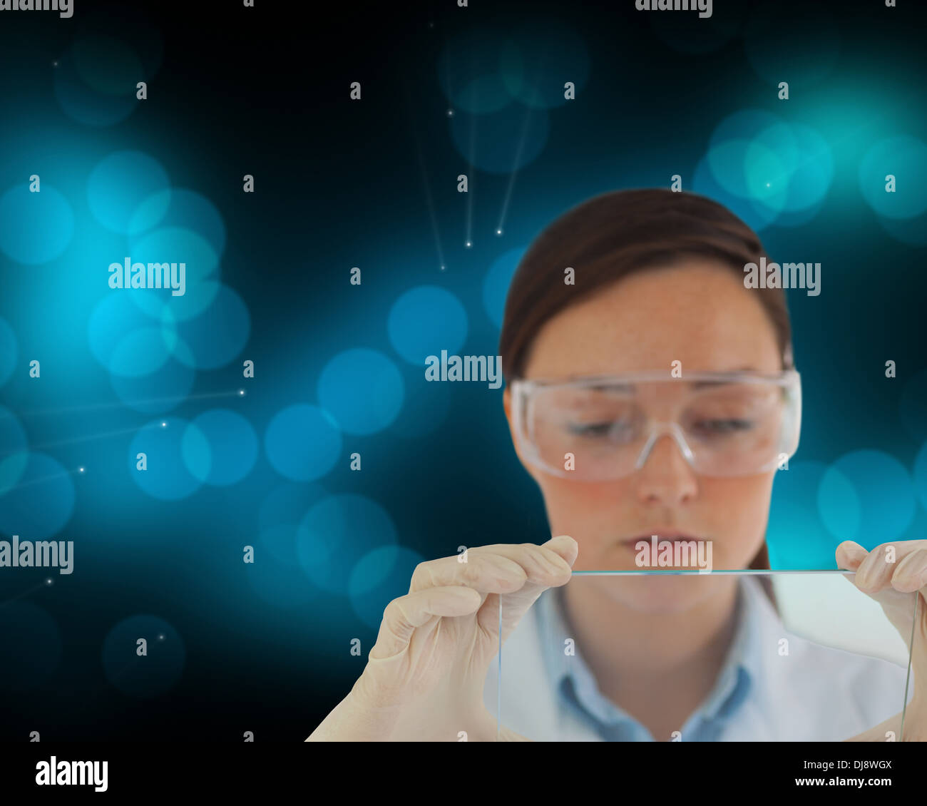 Young doctor holding clear pane Stock Photo - Alamy