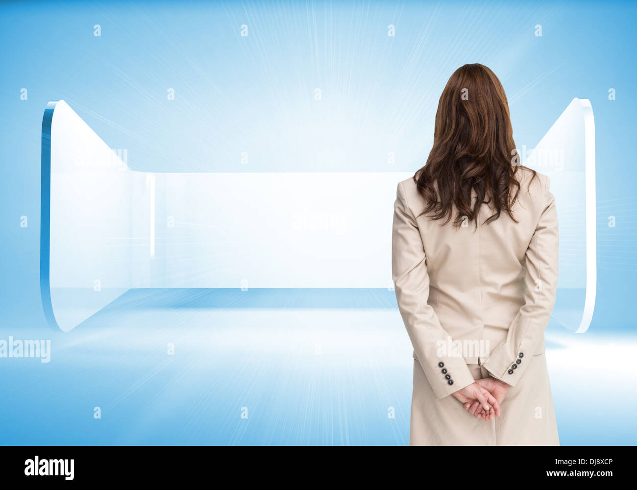 Woman standing with hands behind her back hi-res stock photography and ...