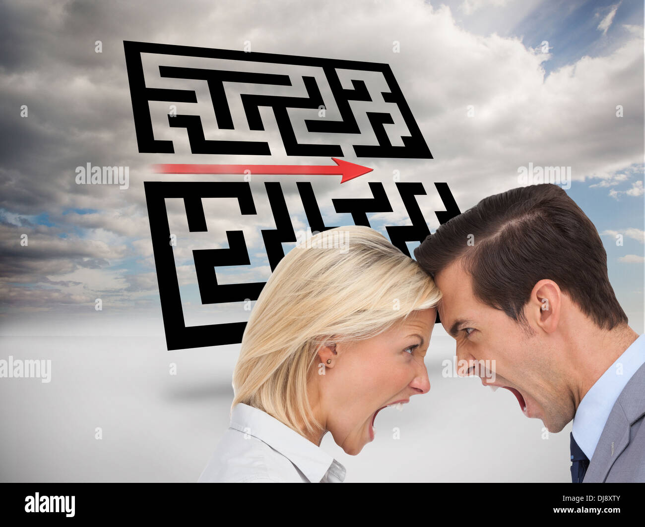 Colleagues quarreling head against head Stock Photo - Alamy