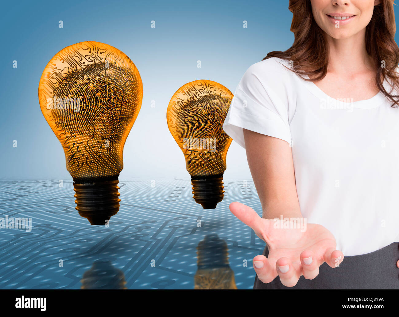 Attractive businesswoman showing her empty hand Stock Photo - Alamy
