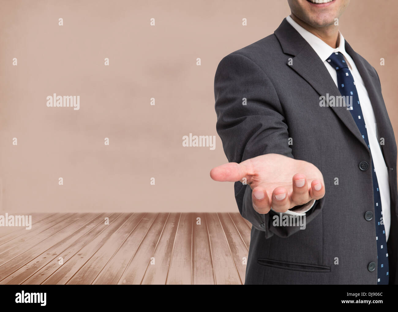 Businessman showing his empty hand Stock Photo - Alamy