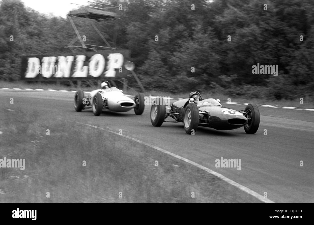 Jim Clark in a Lotus 21 leads Stirling Moss in a BRP Lotus 18-21 ...