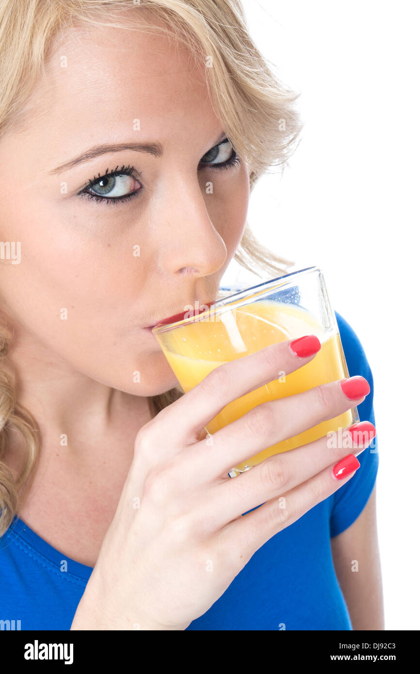 Model Released. Attractive Young Woman Drinking Orange Juice Stock ...