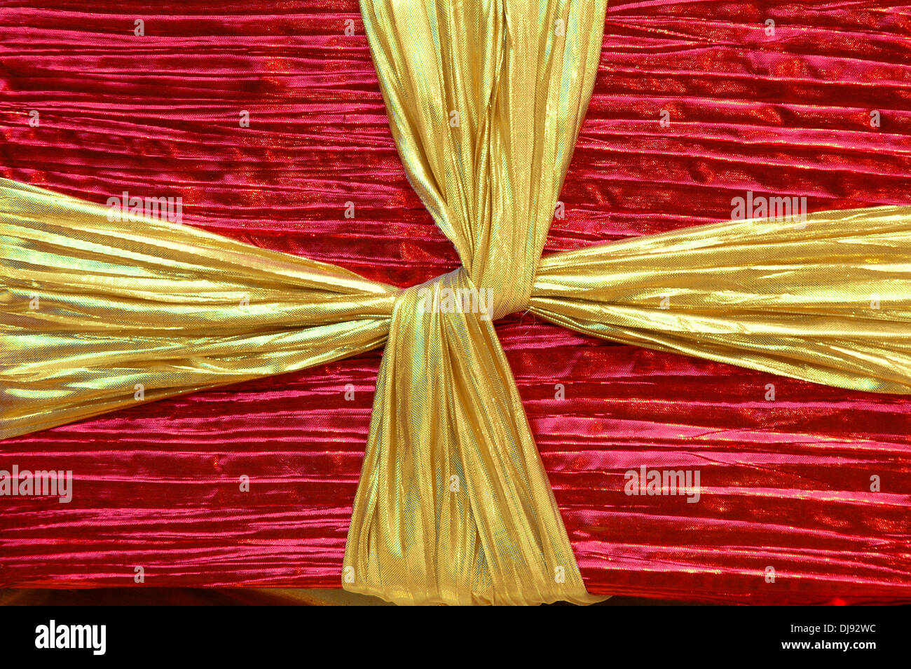 A Christmas package in red with a golden ribbon is pictured on 22 ...