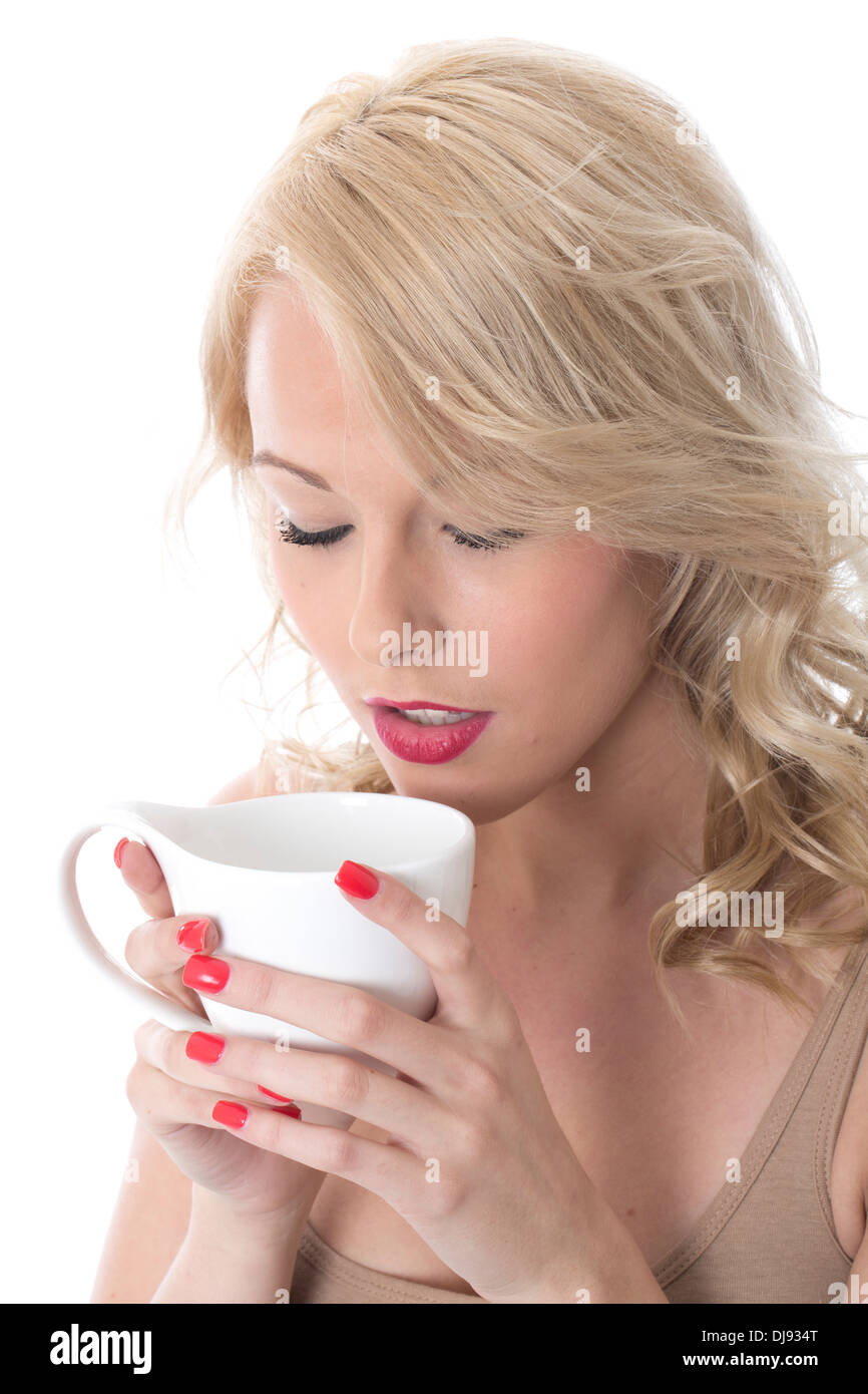 Model Released. Attractive Young Woman Drinking Coffee Stock Photo - Alamy