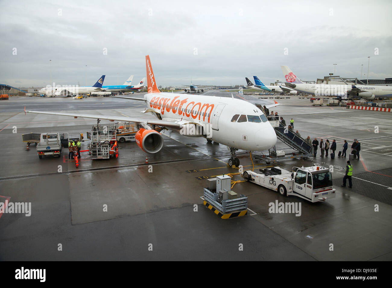 Passengers boarding an Easyjet plane at Schipol Airport, Amsterdam ...