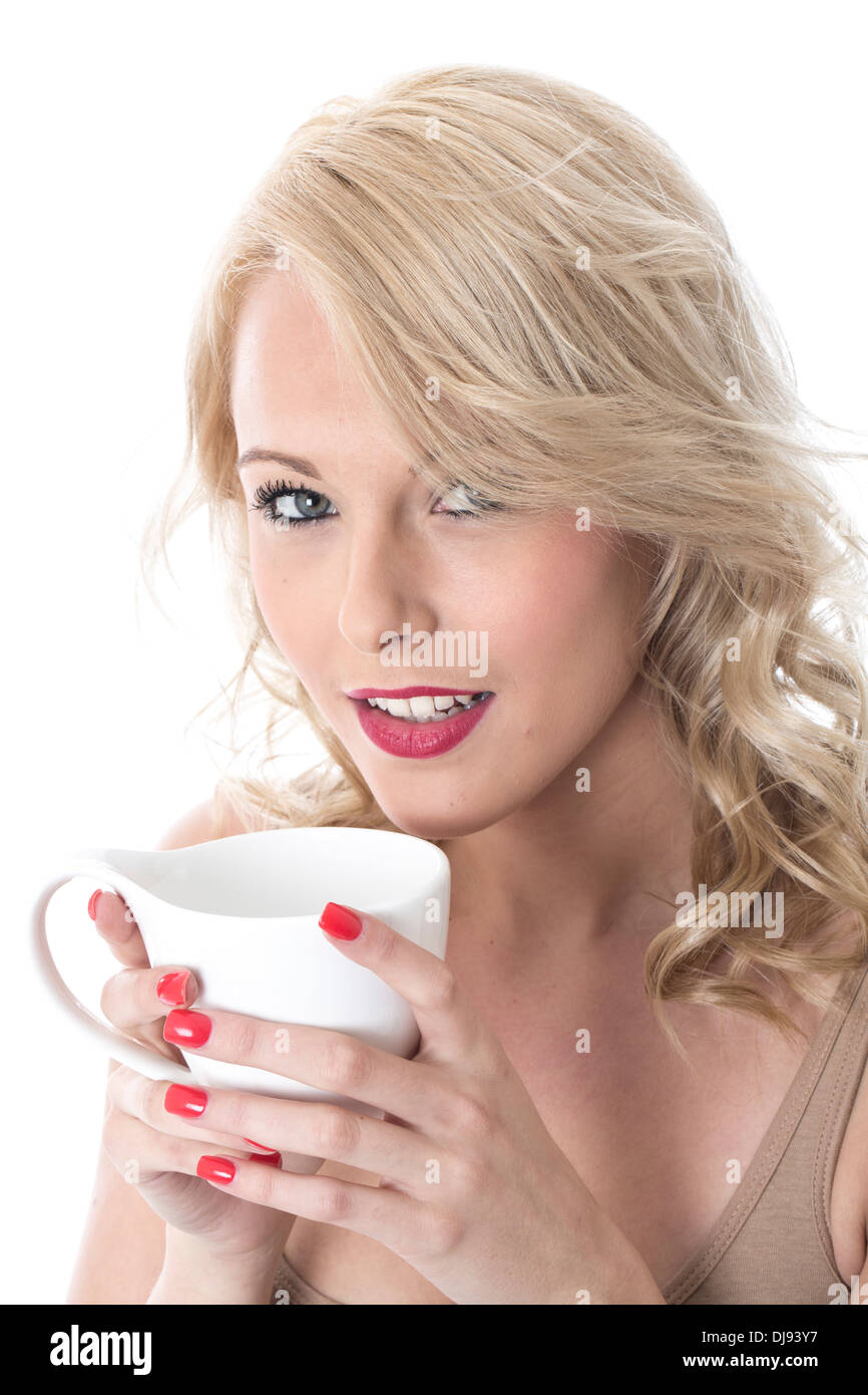 Model Released. Attractive Young Woman Drinking Coffee Stock Photo - Alamy