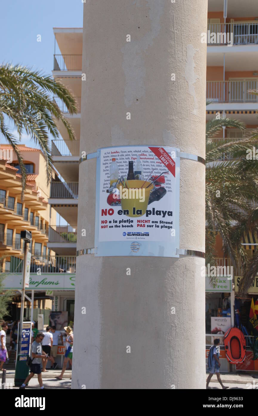 A poster on the beach in Palma de Mallorca warning that consuming ...