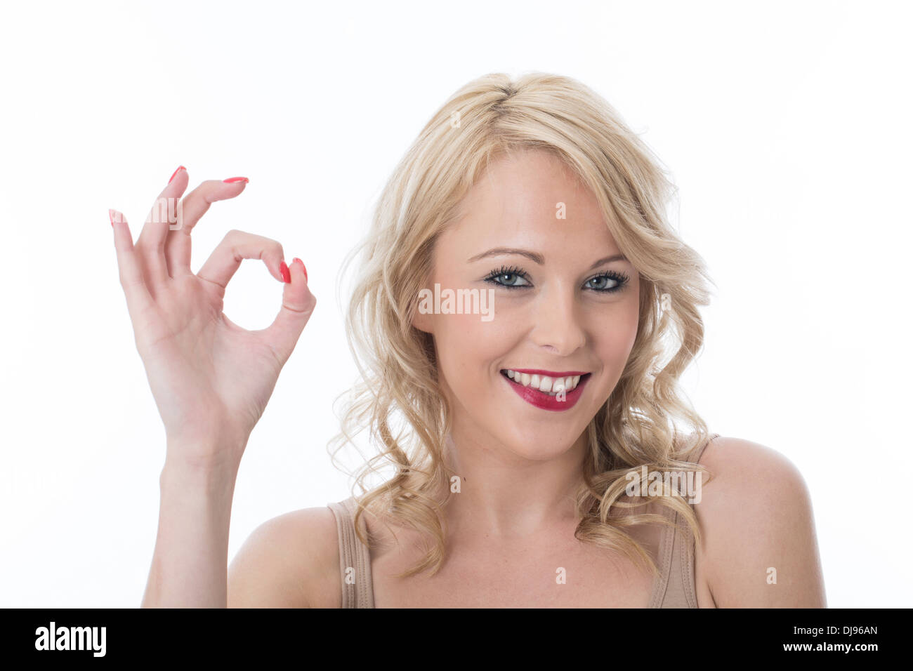 Model Released. Attractive Young Woman Making OK sign Stock Photo - Alamy