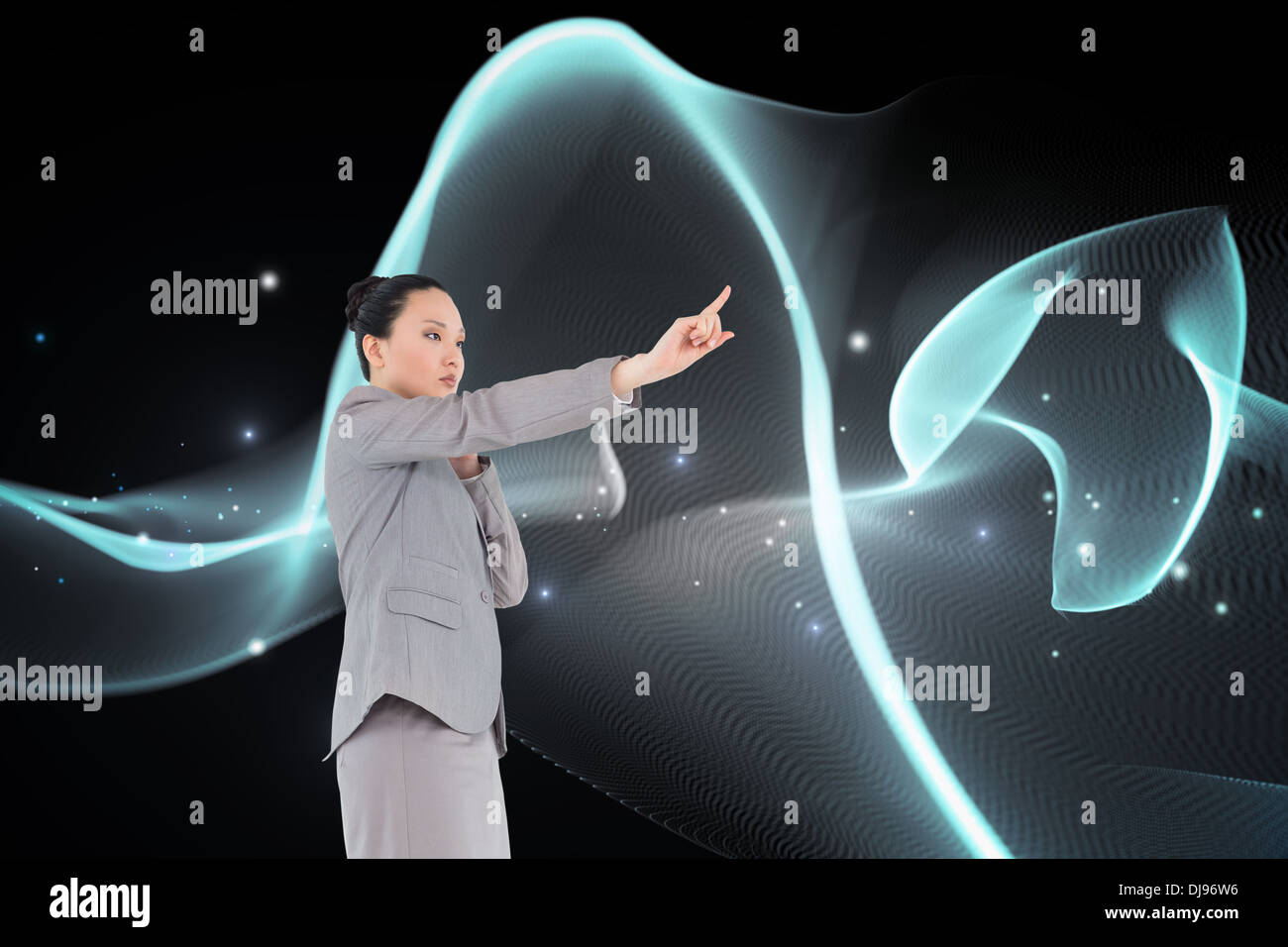 Composite image of thoughtful asian businesswoman pointing Stock Photo ...