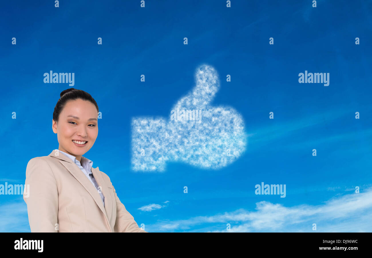 Woman smiling pointing thumb hi-res stock photography and images - Alamy