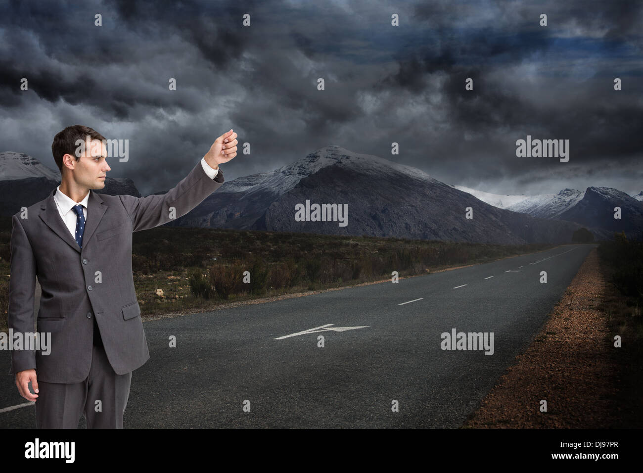 Composite image of stern businessman pointing Stock Photo - Alamy