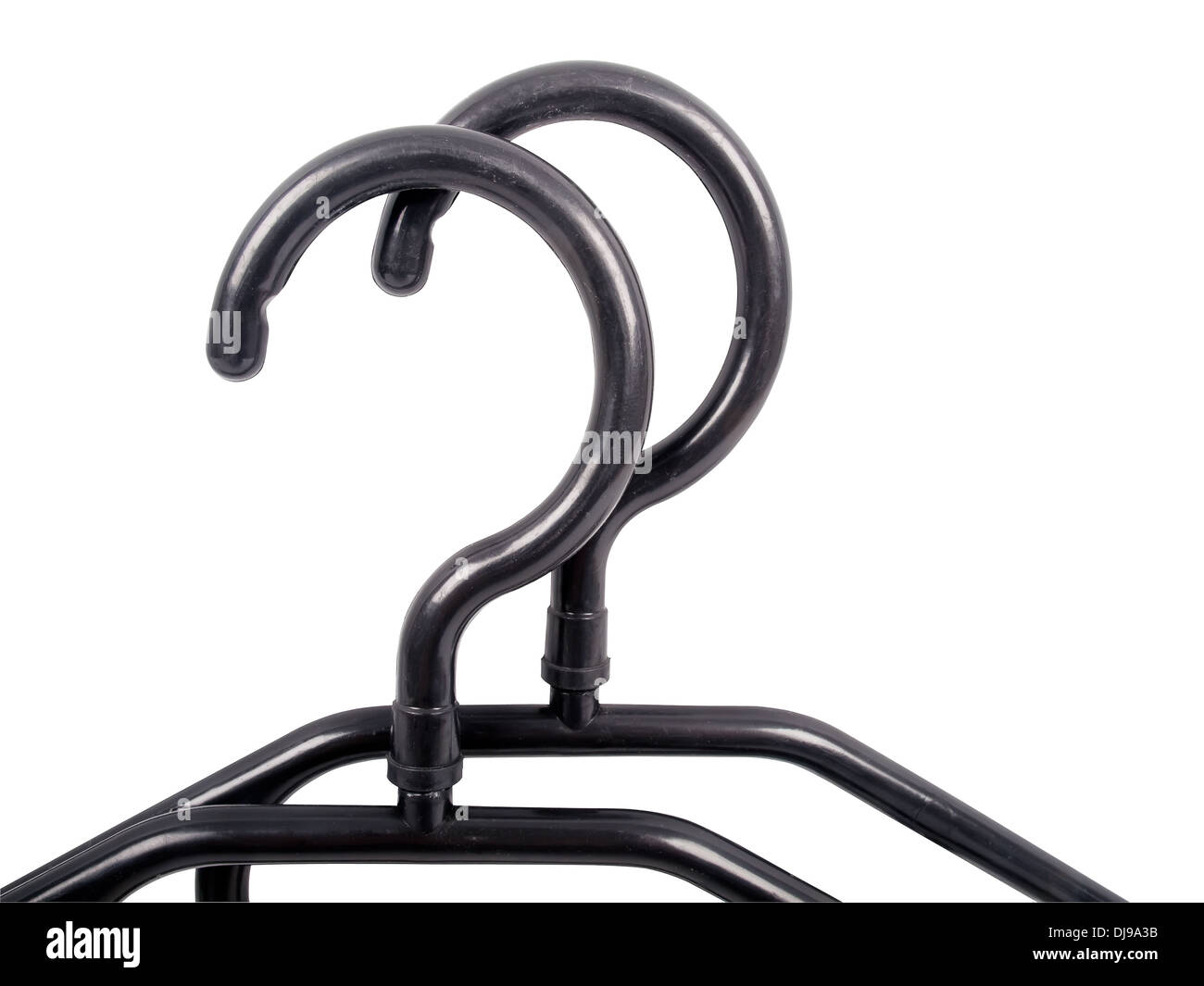 black hangers, upside parts of plastic black hangers isolated on white ...