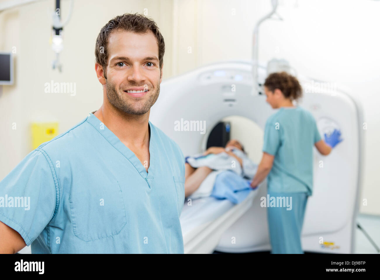 Nurse With Colleague Preparing Patient For CT Scan Stock Photo - Alamy