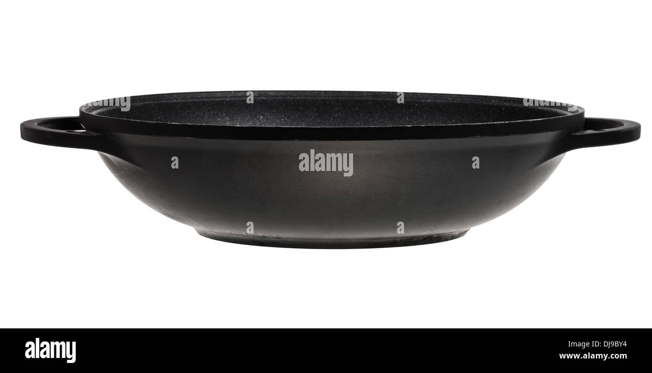 side view of flatter-bottomed wok pan isolated on white background ...