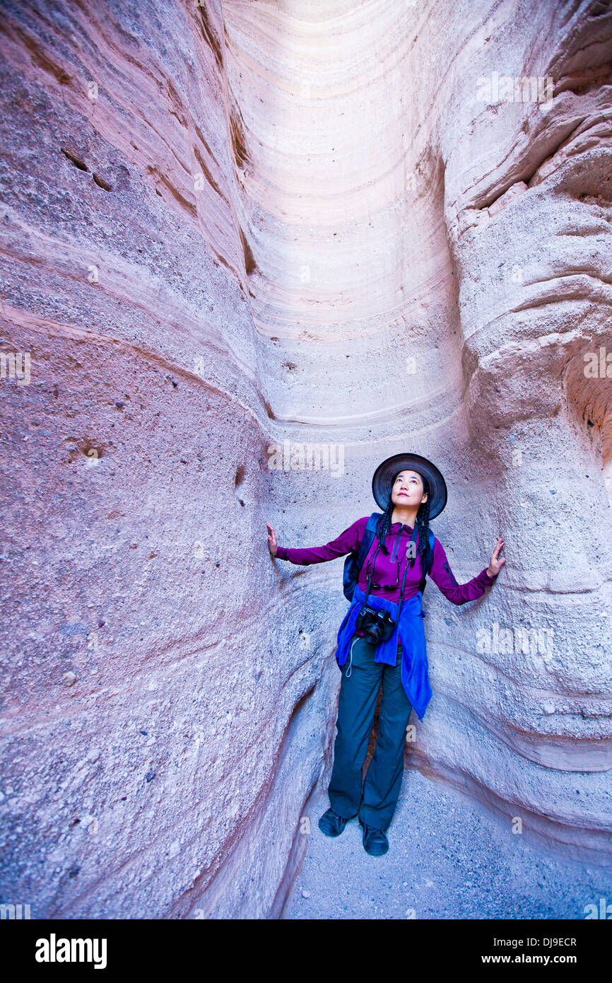 Japanese woman examining rock formations, Santa Fe, New Mexico, United ...