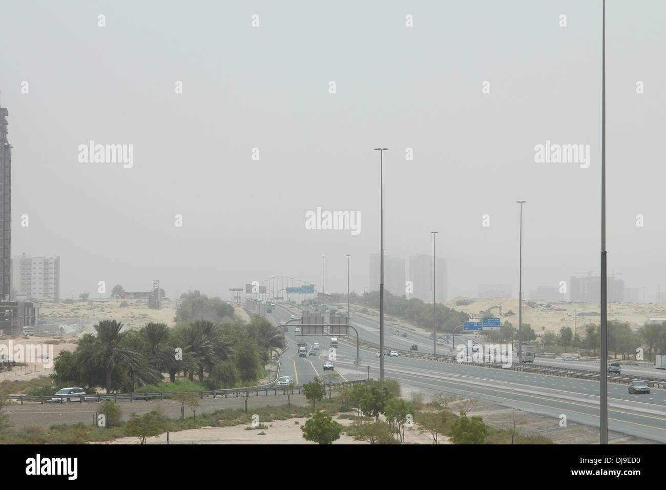 Emirates Road residential buildings Dubailand Dubai Stock Photo - Alamy