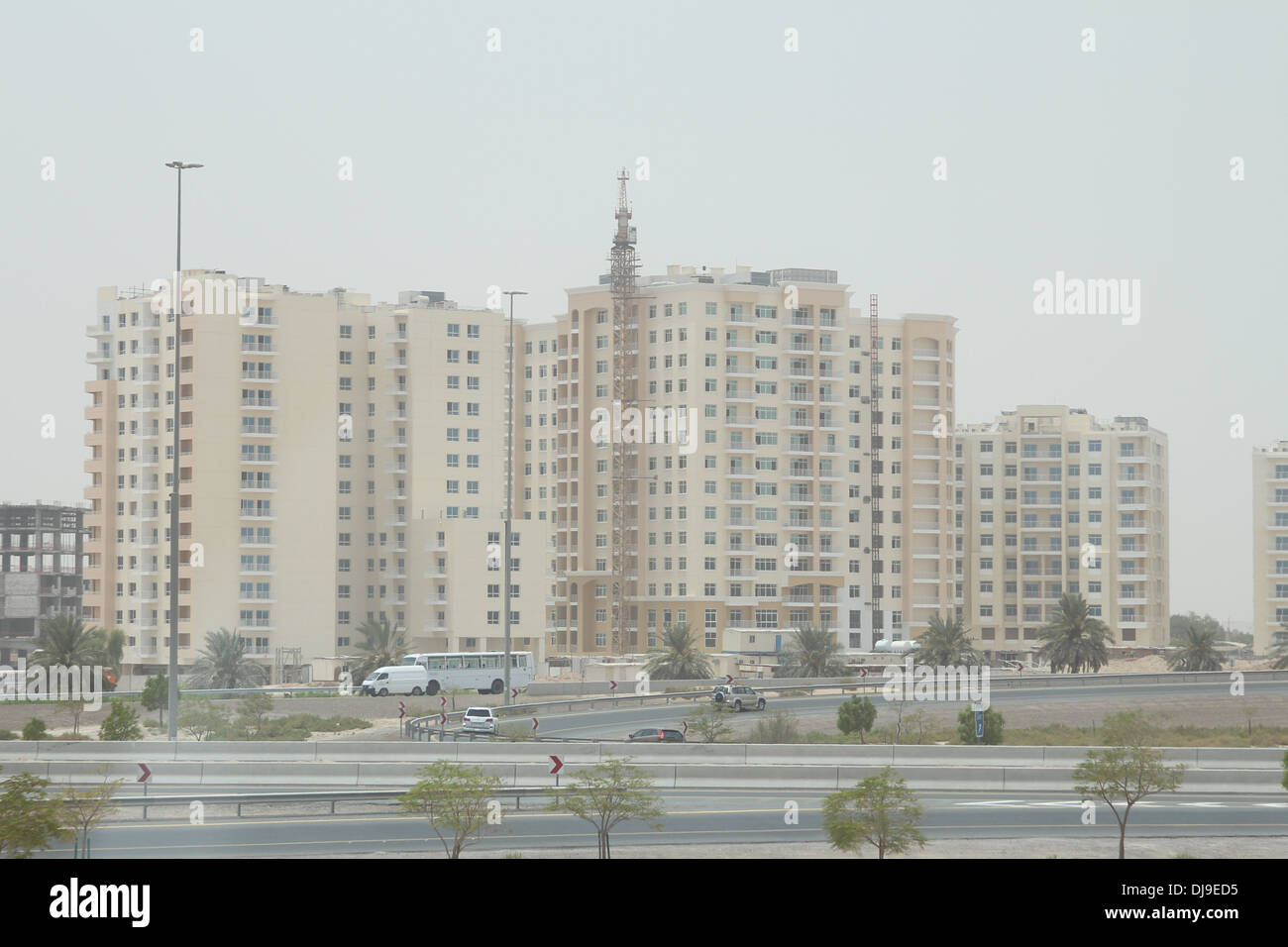Emirates Road residential buildings Dubailand Dubai Stock Photo - Alamy
