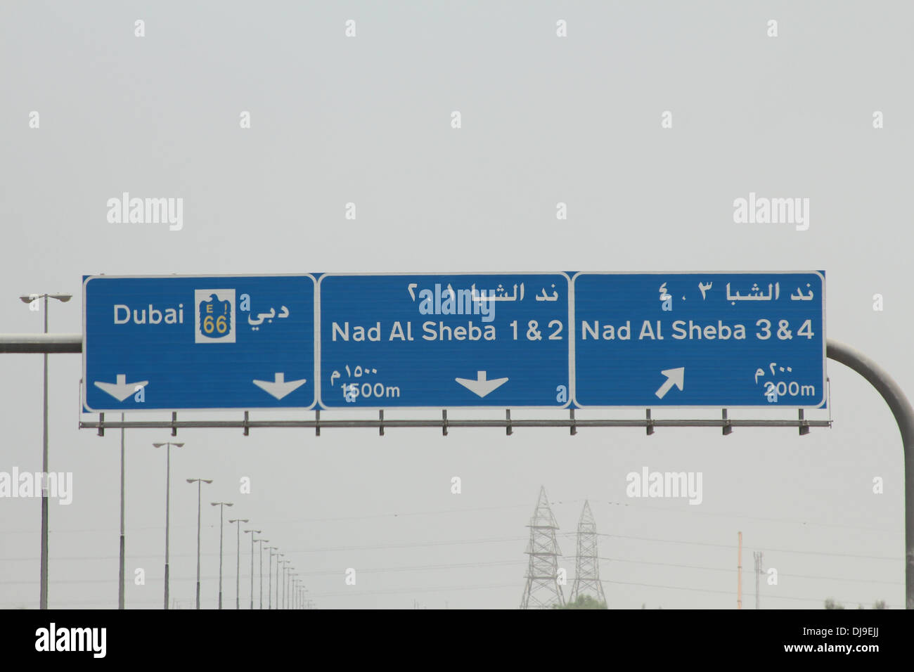 Blue road signs in Dubai UAE Stock Photo - Alamy
