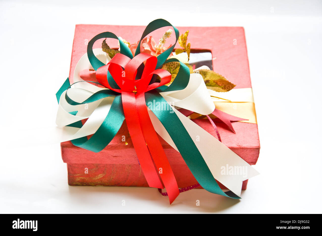 red box and green bow on white background Stock Photo - Alamy