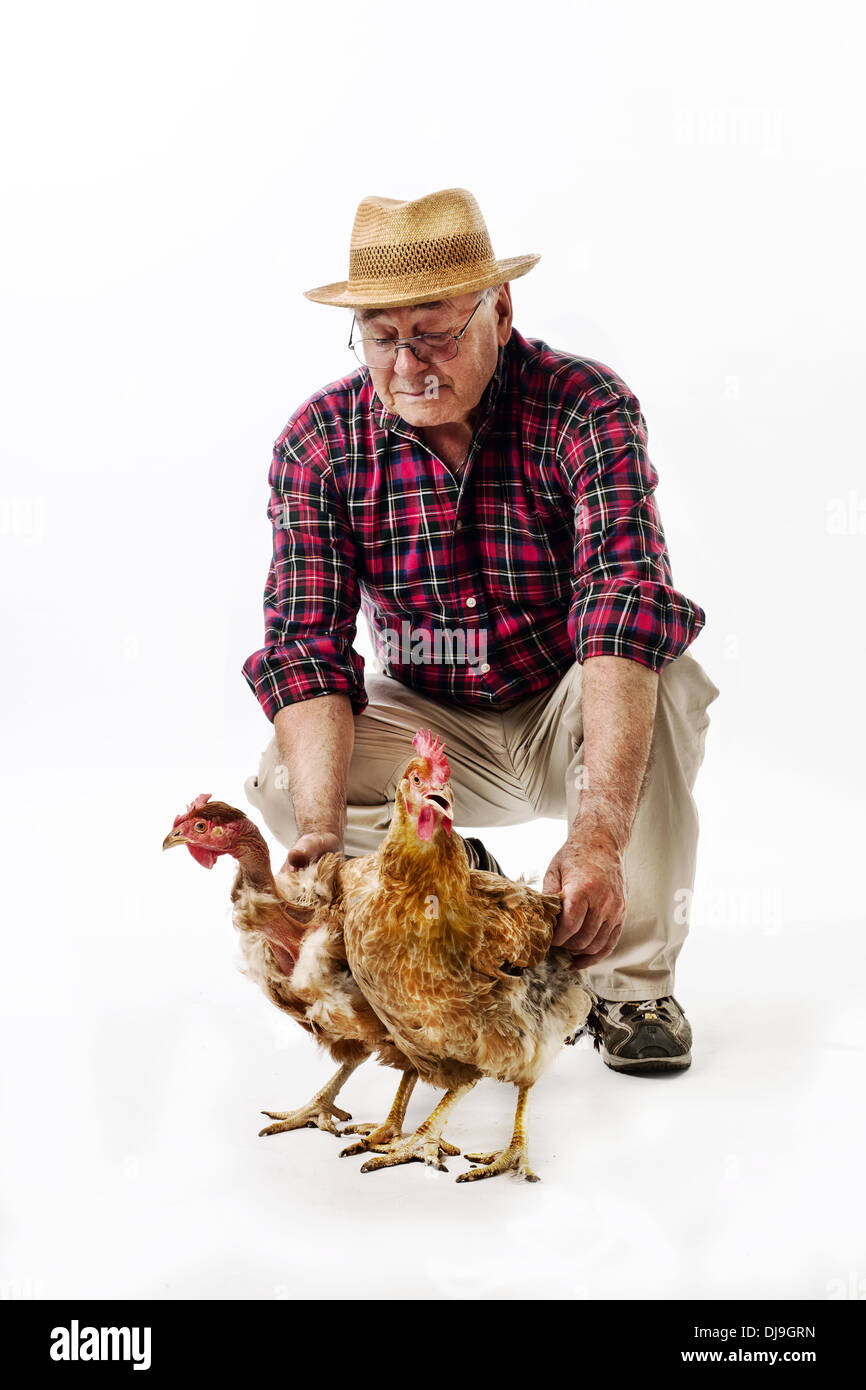 Man, senior Agriculture and chitcken Stock Photo - Alamy