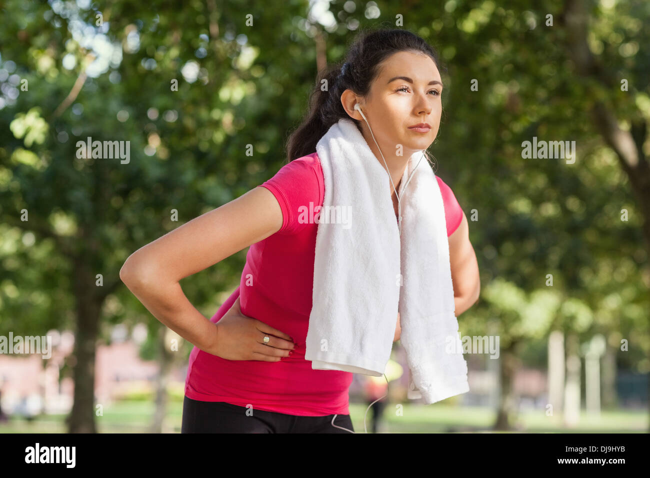 Tired female jogger having break hi-res stock photography and images ...