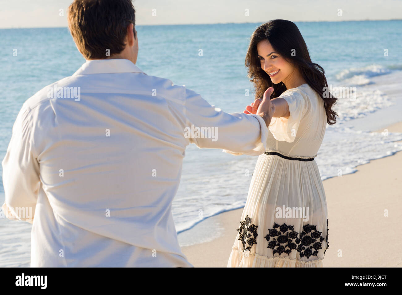 Couple dancing on beach Stock Photo - Alamy