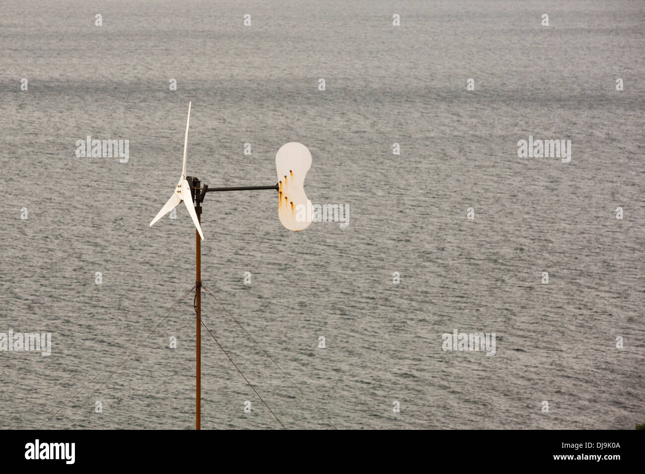 A wind turbine in Scoraig, in NW Scotland, one of the most remote ...