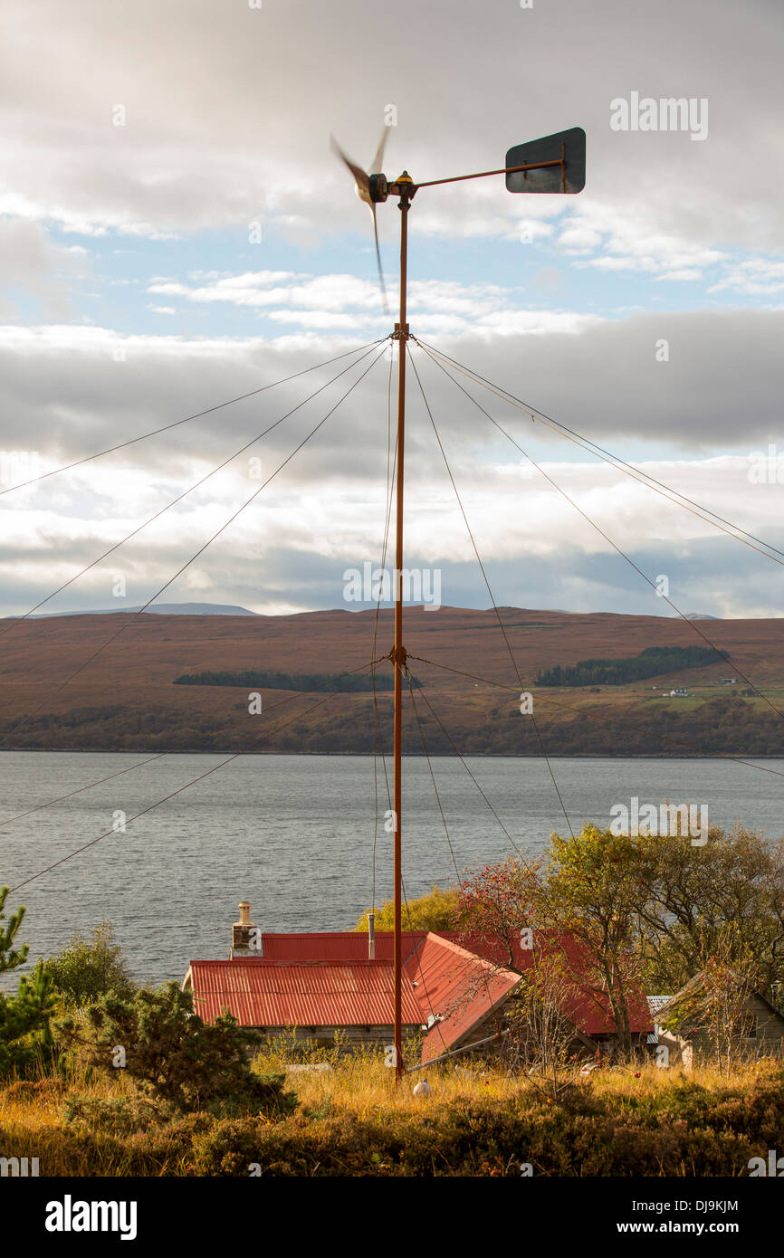 A wind turbine in Scoraig, in NW Scotland, one of the most remote ...