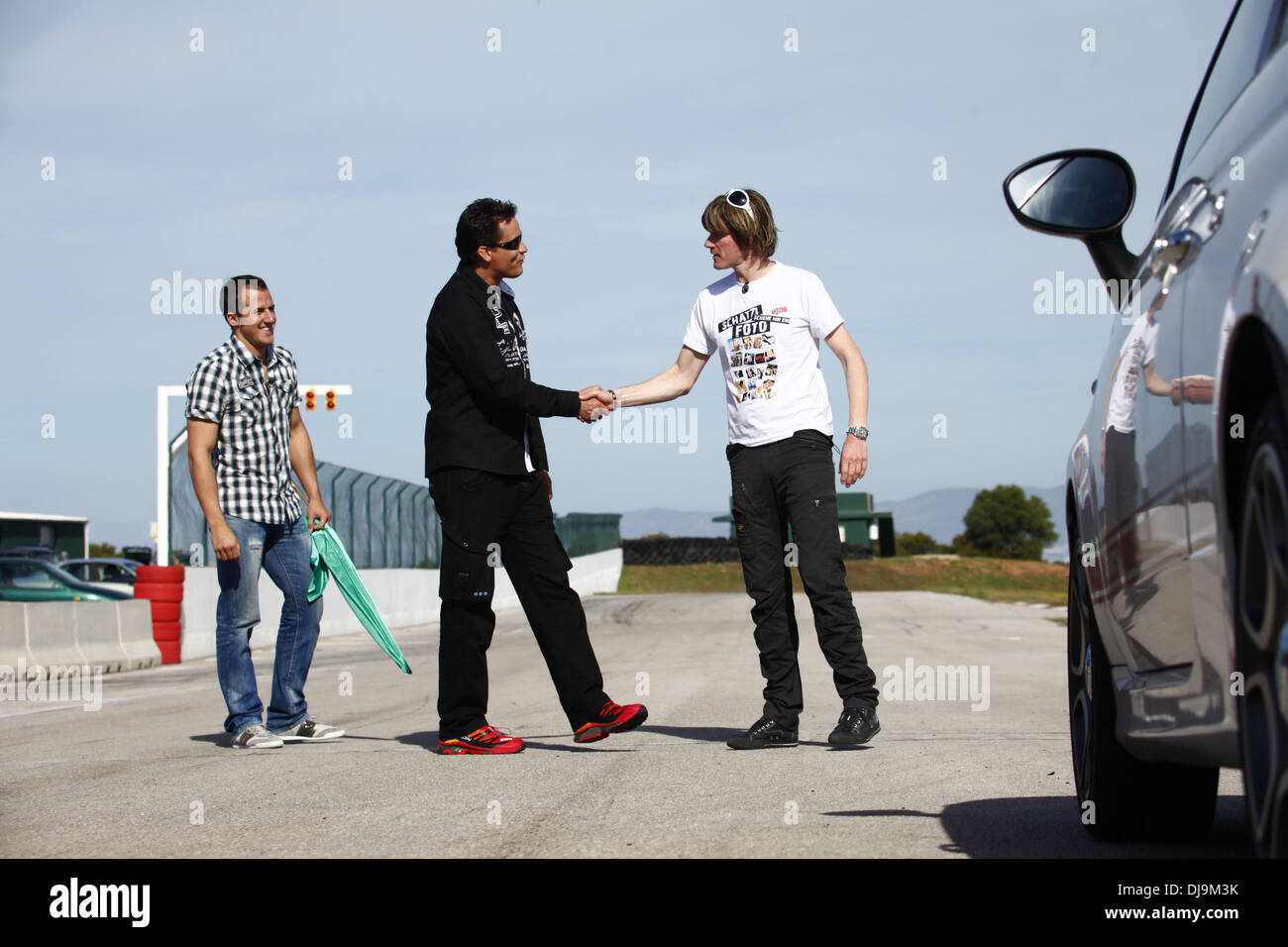 Lance David Arnold, Mickie Krause and Andy Bar filming a car race for ...