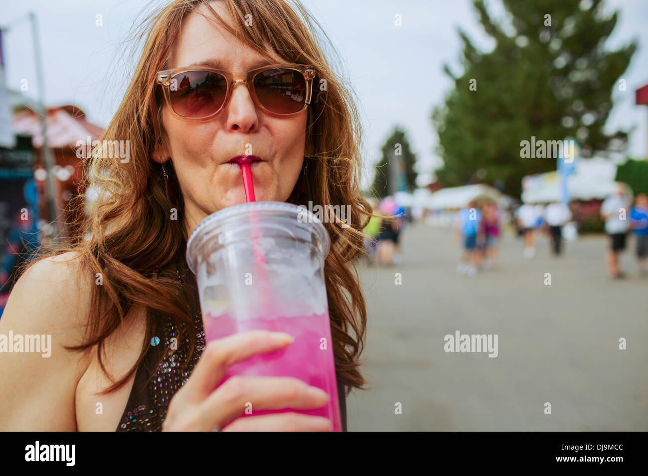 Woman drinking soda hi-res stock photography and images - Alamy