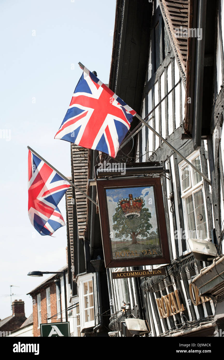 Tudor style public house decorated with Union Jack flying Evesham Stock ...