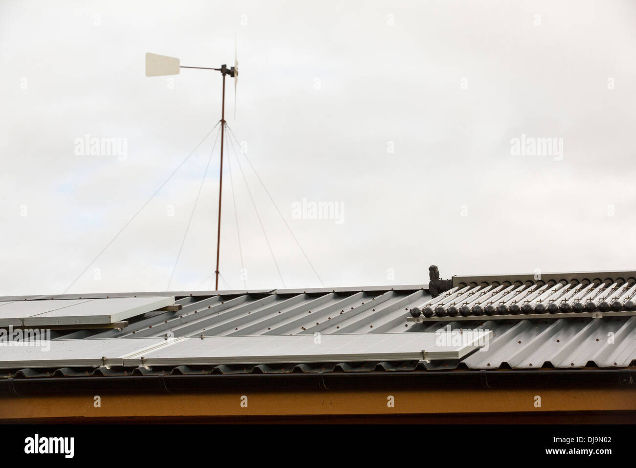 Solar panels and Hugh Piggott's home made wind turbines in Scoraig, in ...