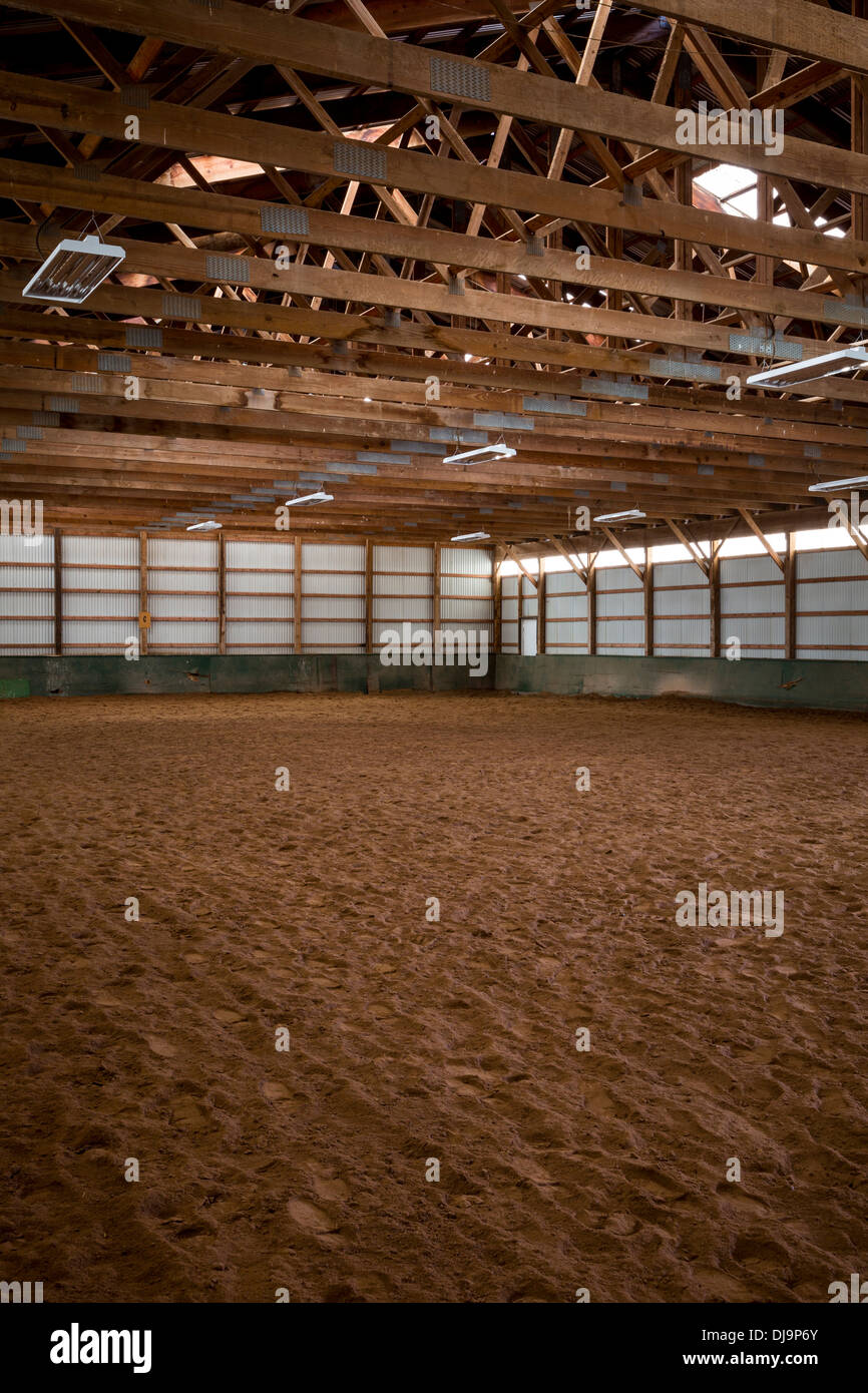 Empty indoor horse riding ring Stock Photo - Alamy